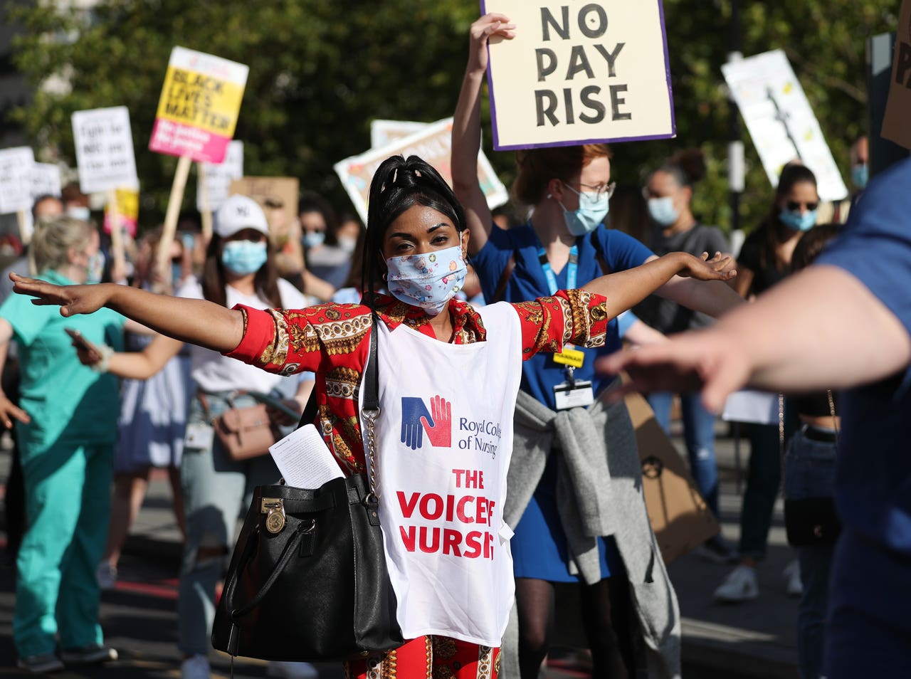 In Pictures: NHS workers march on Downing Street to demand pay rise ...