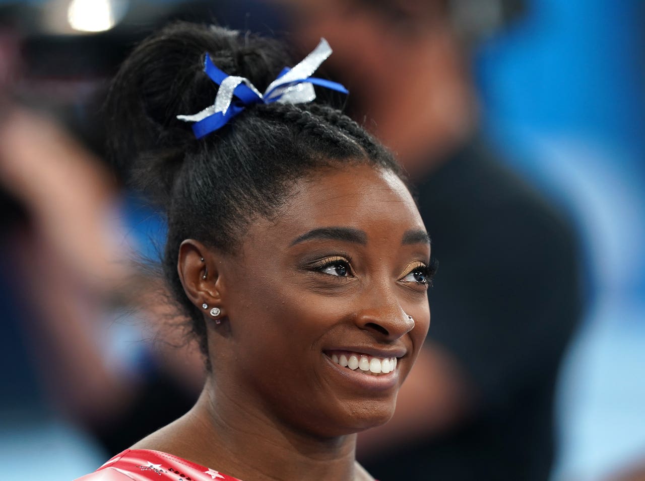 Simone Biles savours her return to Olympic action and takes bronze on ...