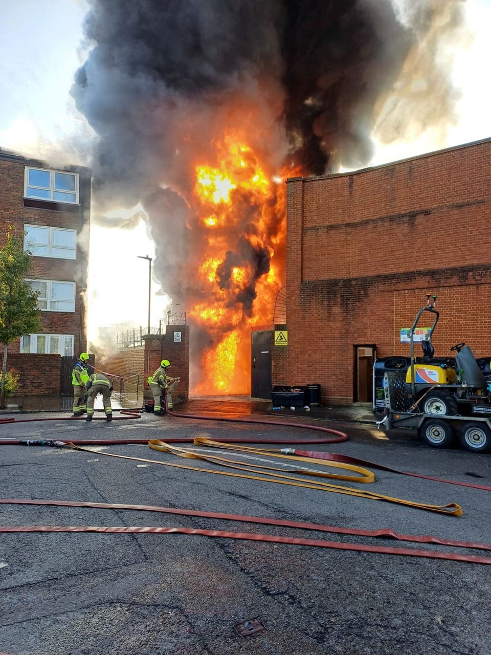 Flats evacuated as 100 firefighters tackle substation blaze in west ...