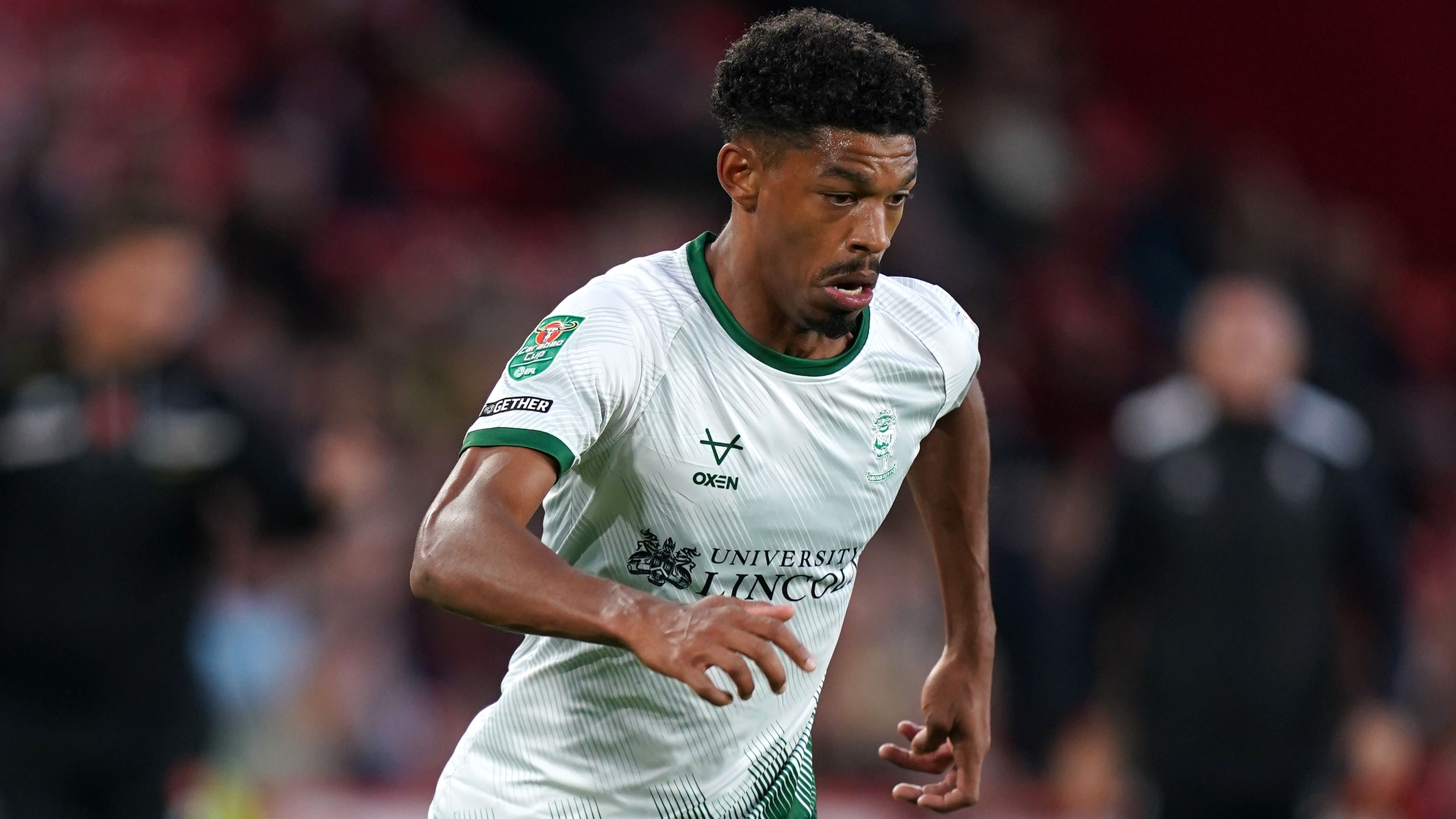 Burton 0-1 Lincoln: Hackett helps 10-man Imps to victory | LiveScore