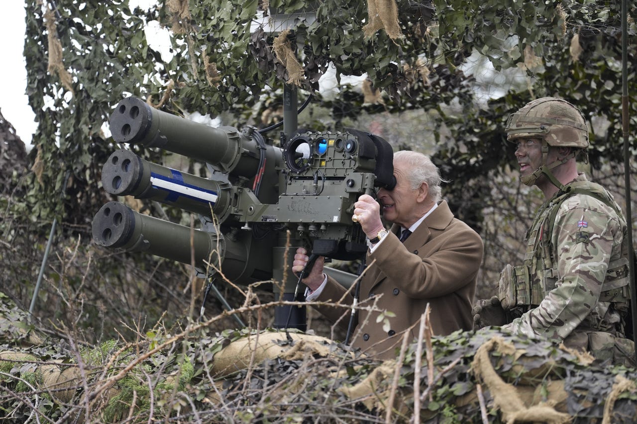 King takes part in air defence exercise and meets military families at ...