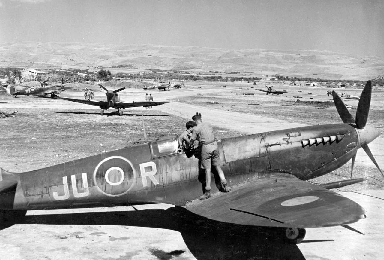 Spitfire pilot laid to rest in Italy more than 70 years after being ...