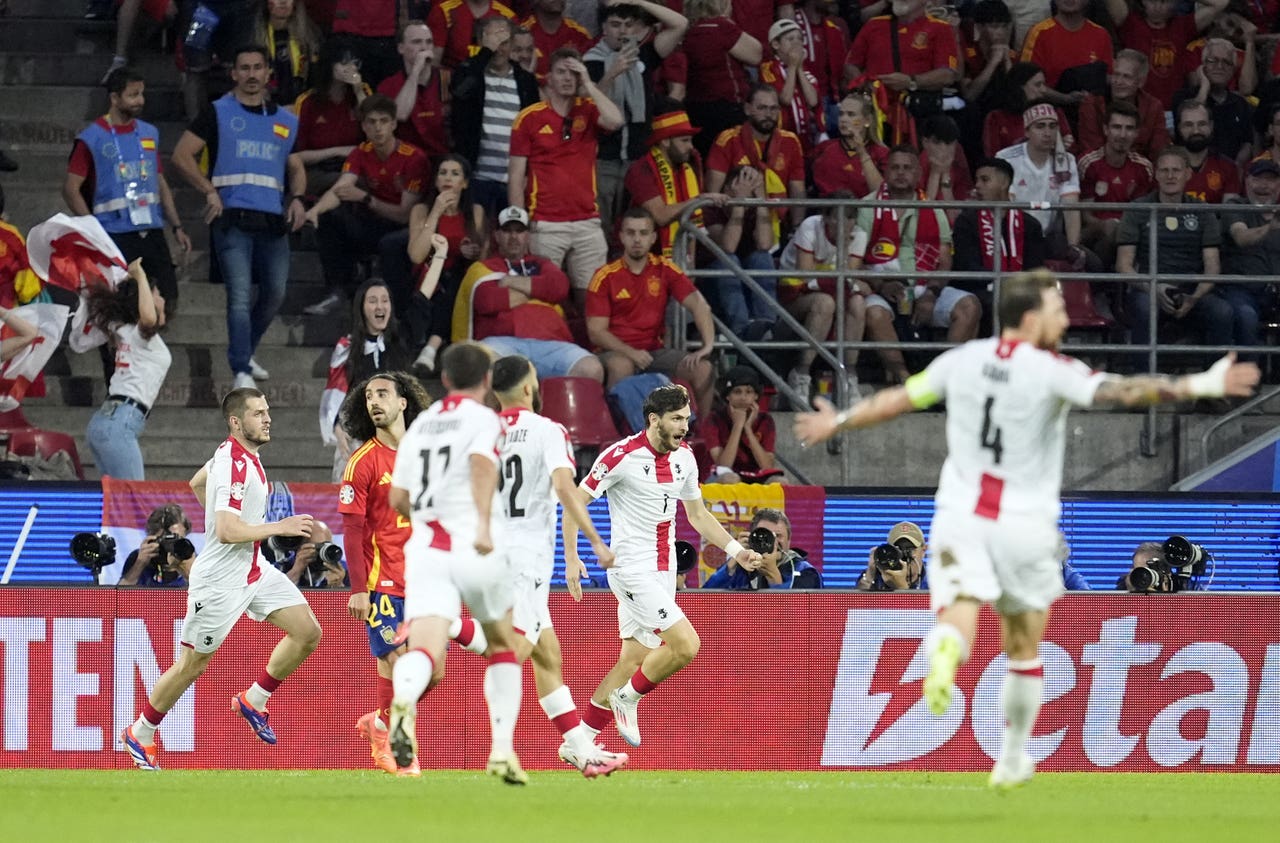 Spain fight back to beat Georgia and set up quarter-final against hosts ...