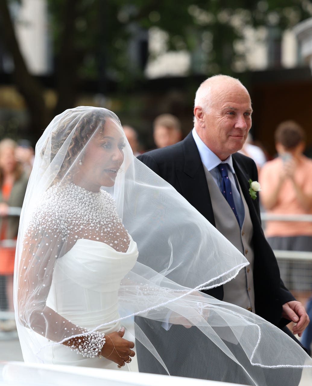 Famous faces including former Spice Girl Emma Bunton arrive for wedding ...