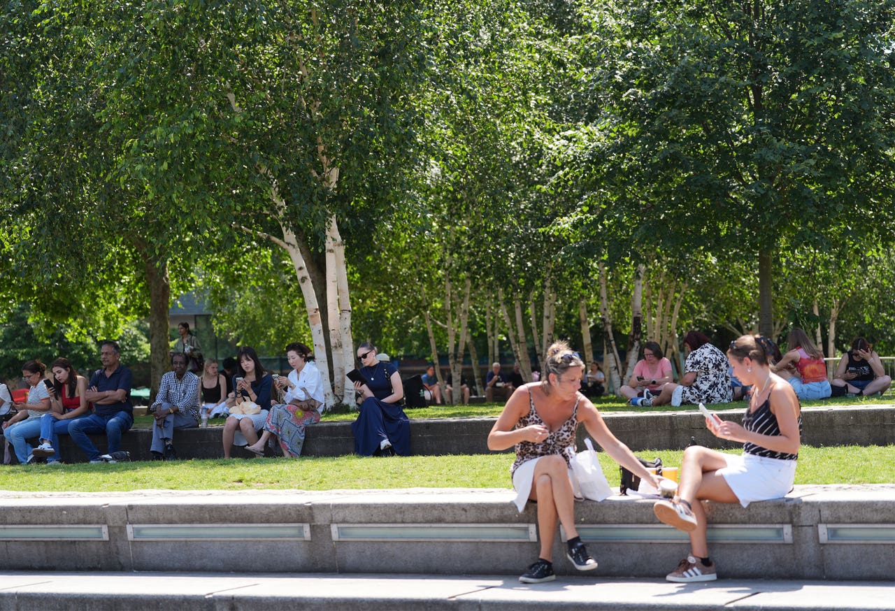 UK set to swelter in up to 38C as extreme heat warning expanded ...