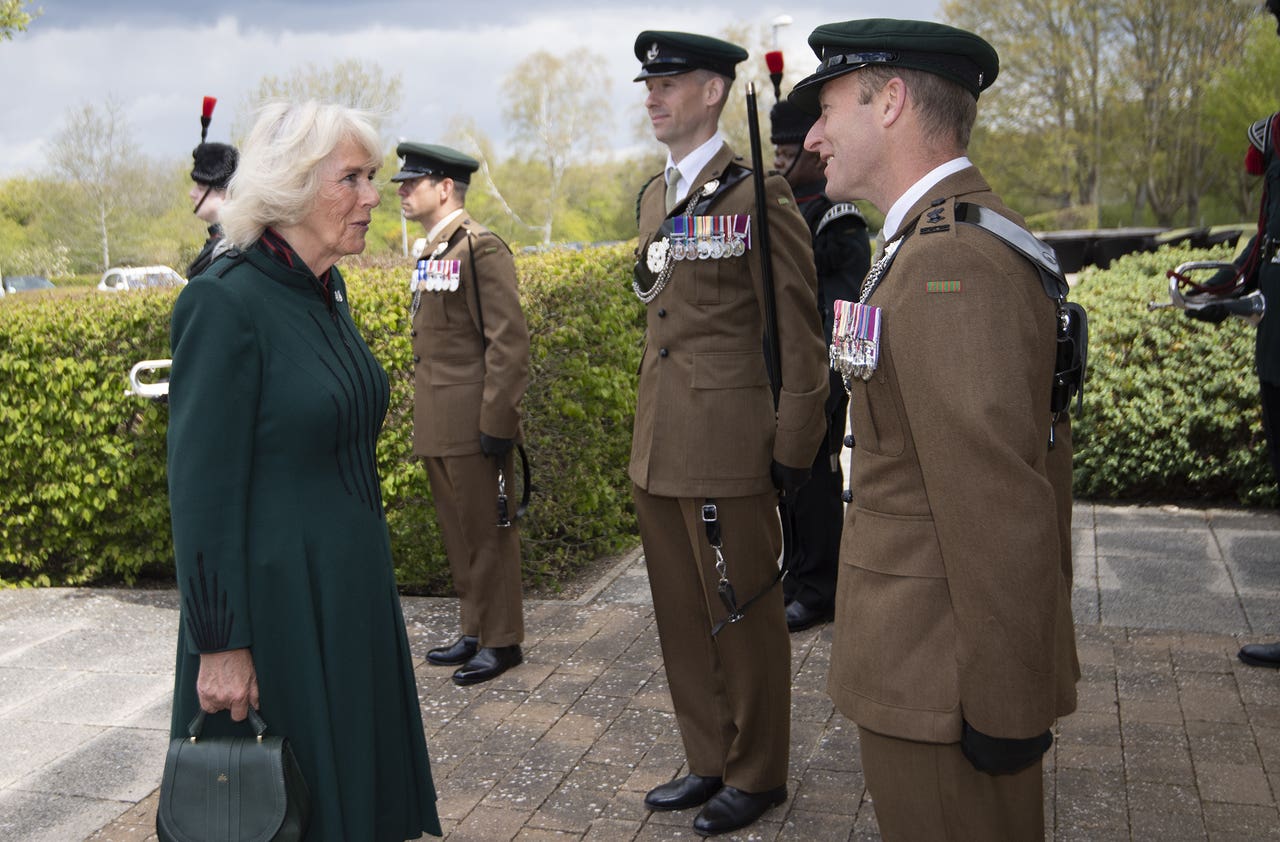Colonel-in-chief Camilla dons regimental coat dress for Rifles visit ...