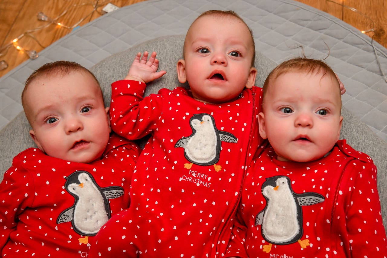 Miracle triplets celebrate first Christmas | Bradford Telegraph and Argus