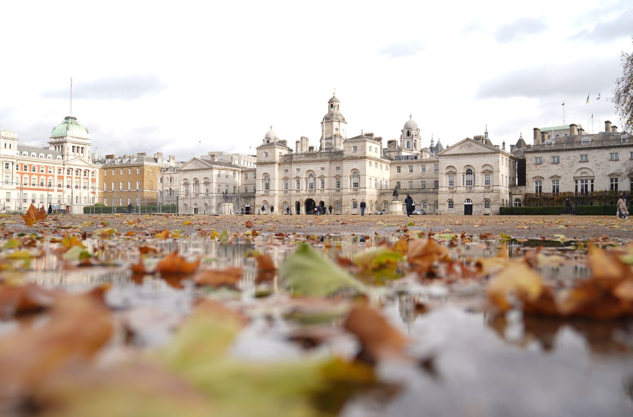In pictures: ‘Atrocious’ weather as band of rain travels across the UK