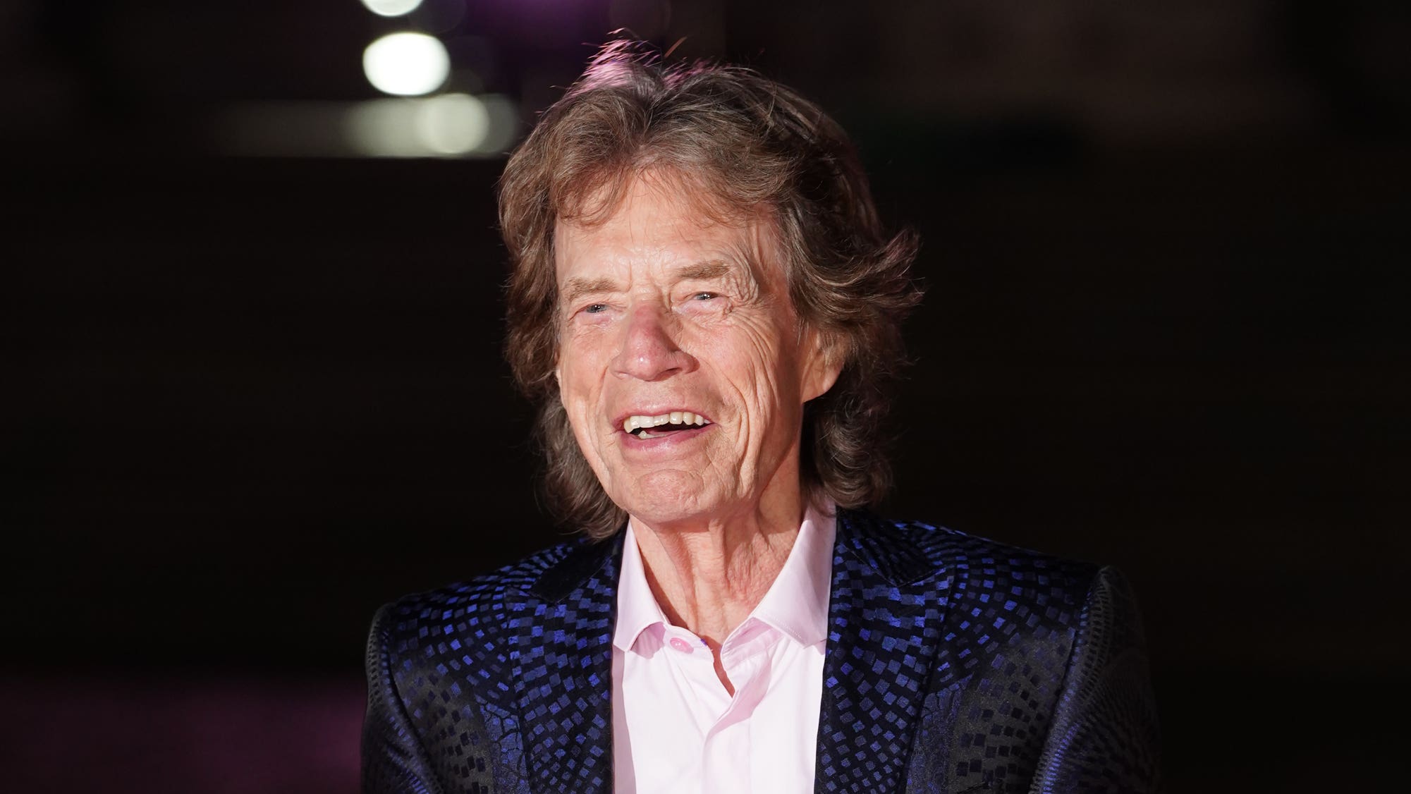 Sir Mick Jagger makes surprise visit to his old school - PA Media