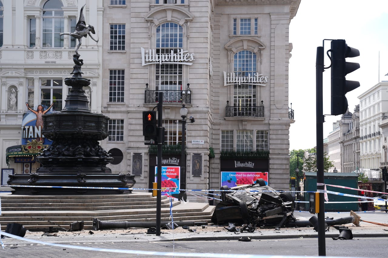 Young man fighting for life after BMW overturns in Piccadilly Circus ...