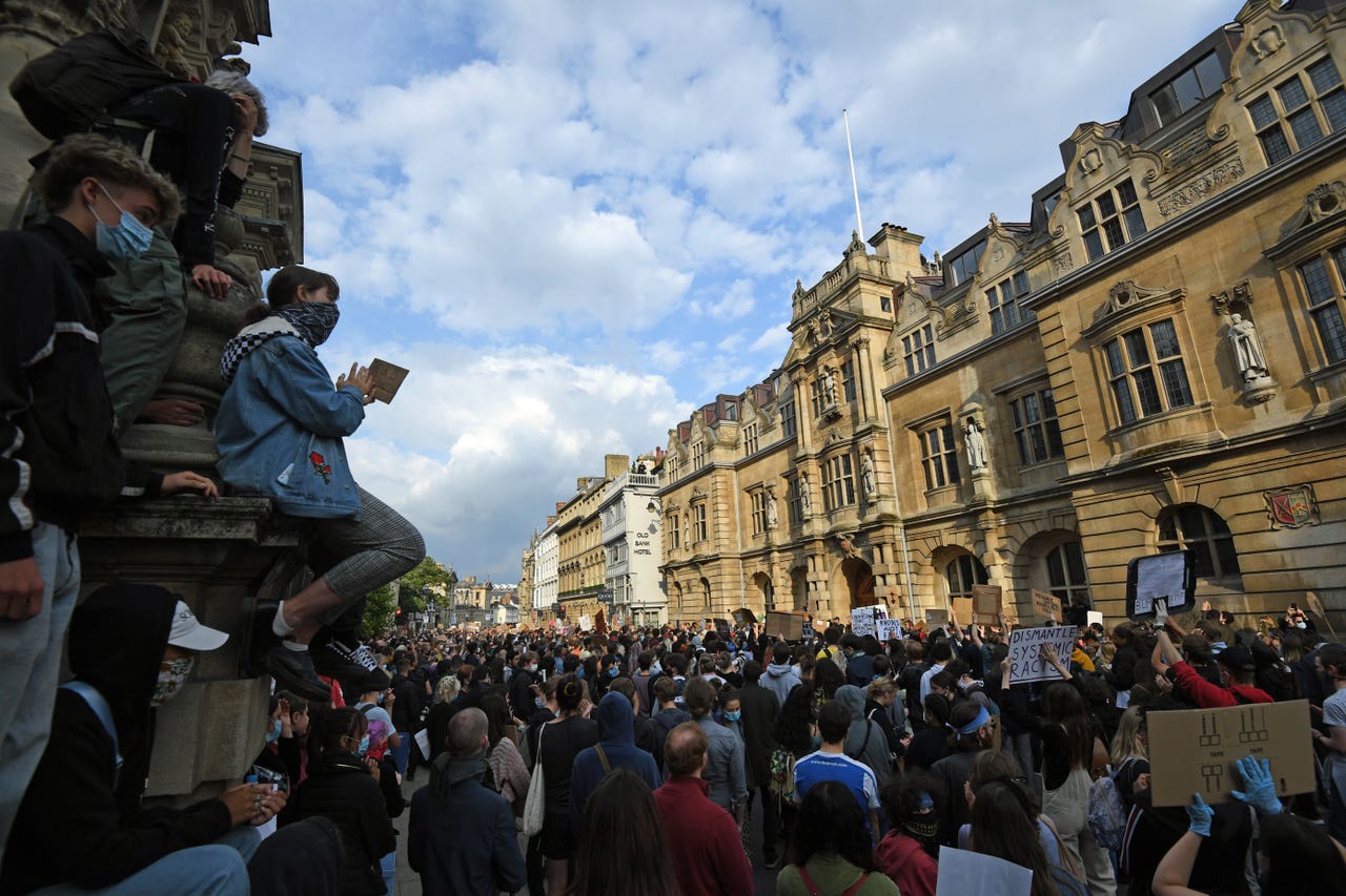 Protesters block street in protest over Cecil Rhodes statue | Express ...