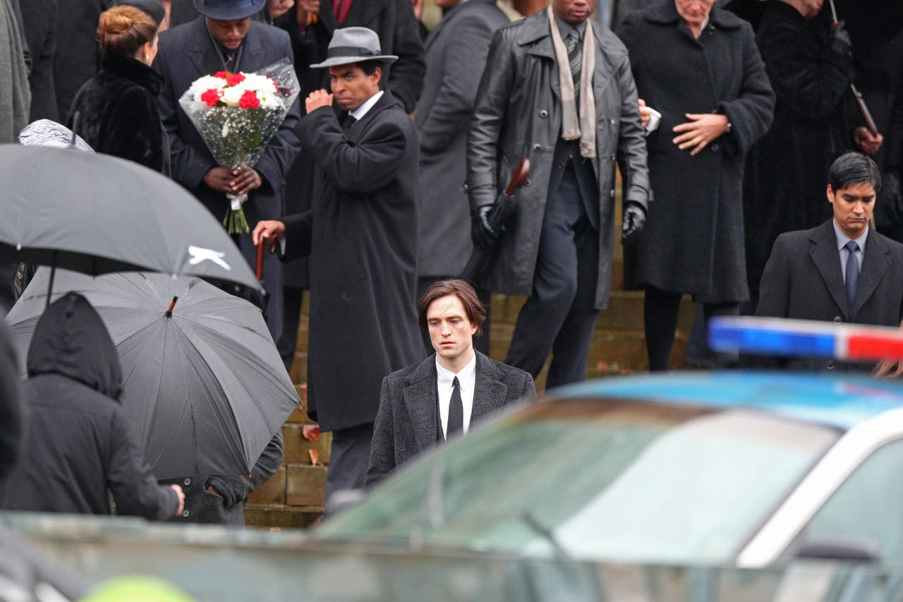 Robert Pattinson pictured filming funeral scene for The Batman in ...