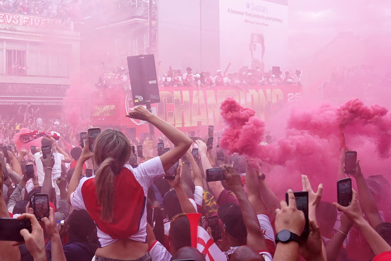 Stacey Solomon and Joe Swash celebrate Arsenal title win at bus parade ...