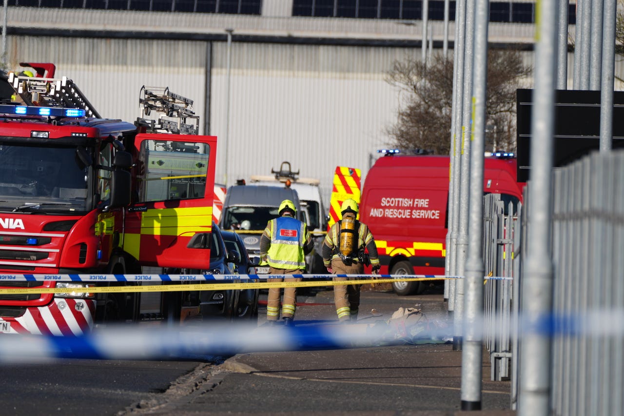 Six people in hospital after large fire at industrial estate in North ...