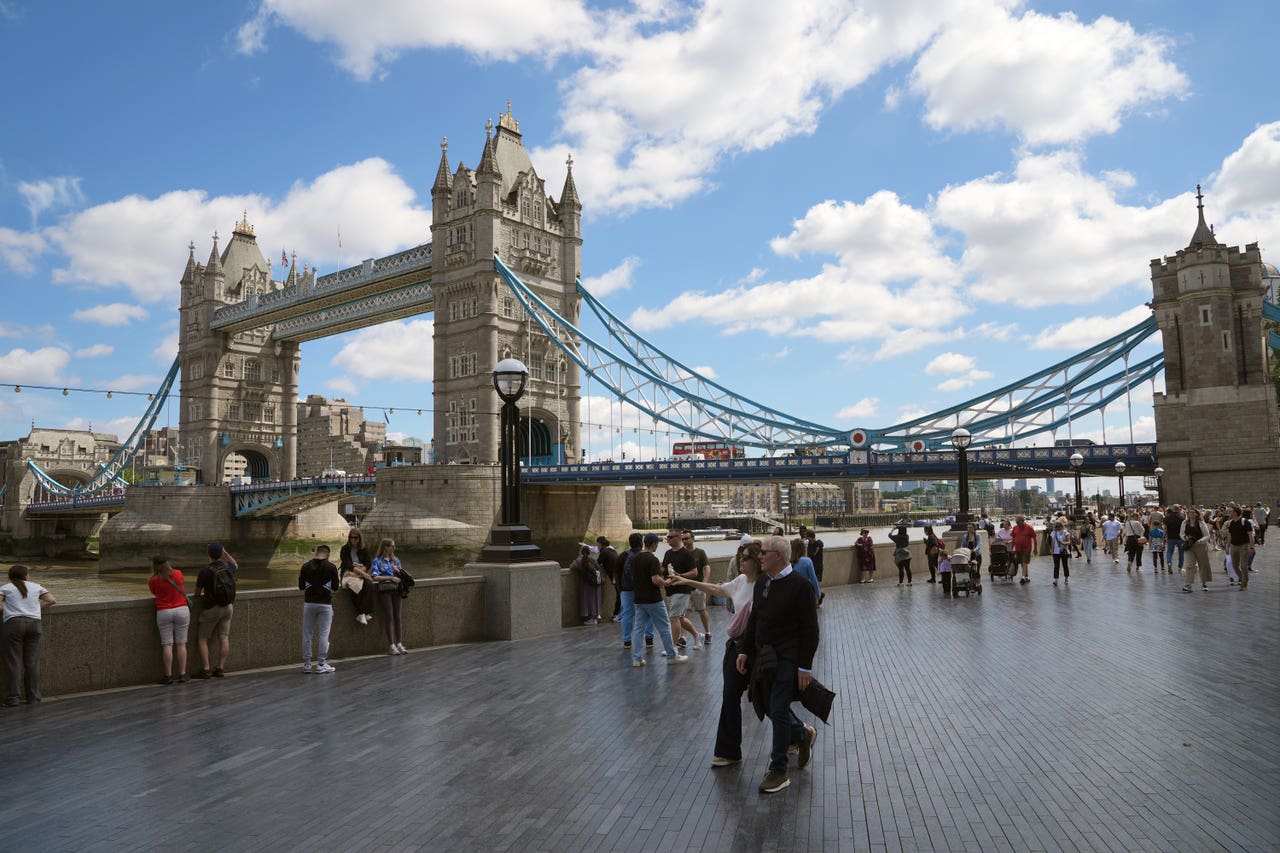 Tower Bridge and Cutty Sark on Big Half finisher medal designed with ...