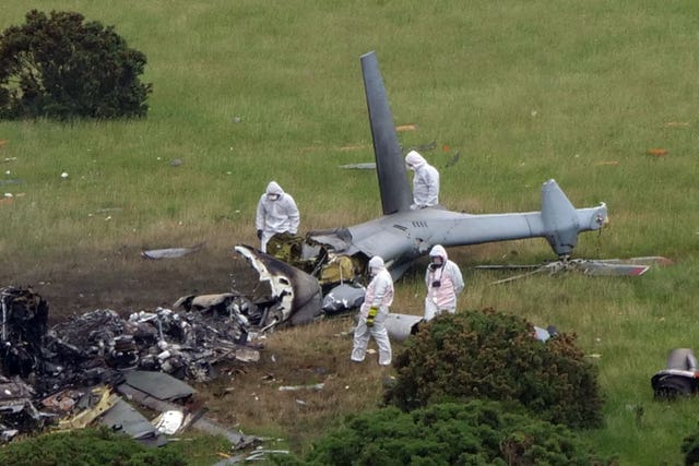 Royal Navy helicopter crash victims named as families and military pay ...