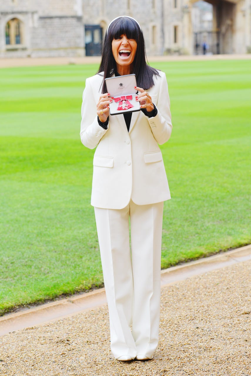 Claudia Winkleman smiles ear to ear after officially being made an MBE ...