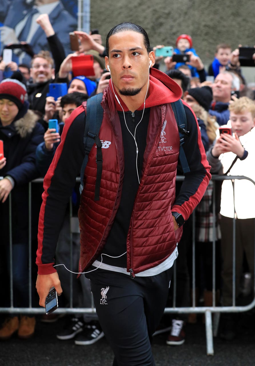 Assured Van Dijk proves worth again as Liverpool squeeze past Brighton ...