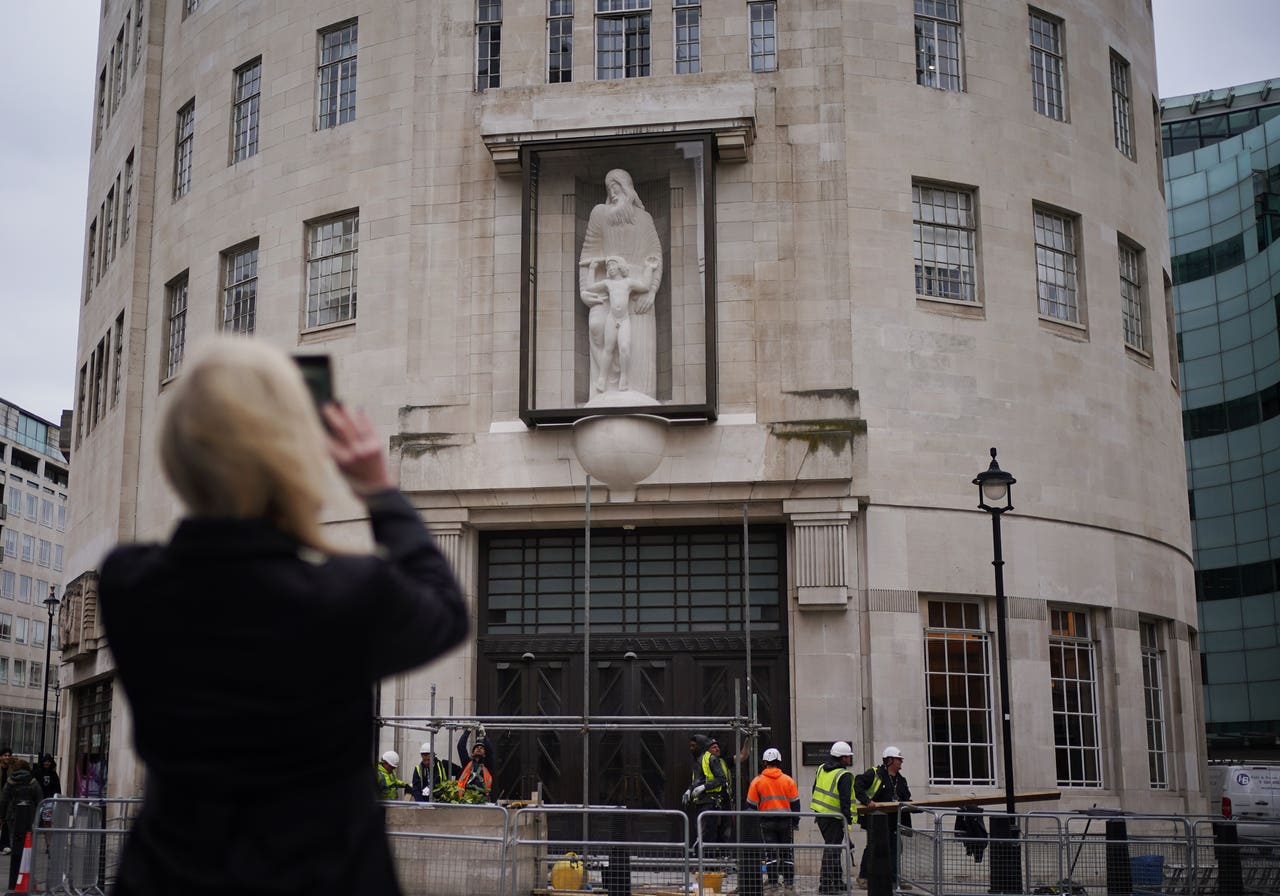 Controversial statue outside BBC headquarters goes back on display ...