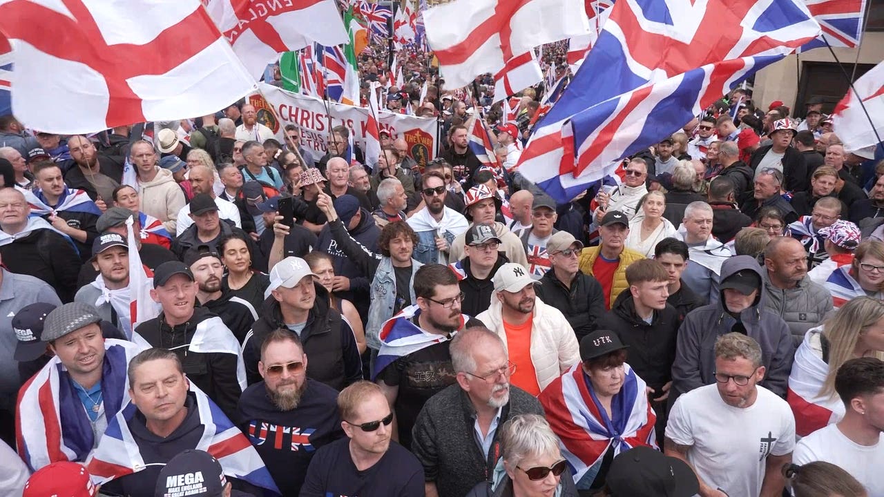 Thousands gather in London for Tommy Robinson rally and counter-protest ...