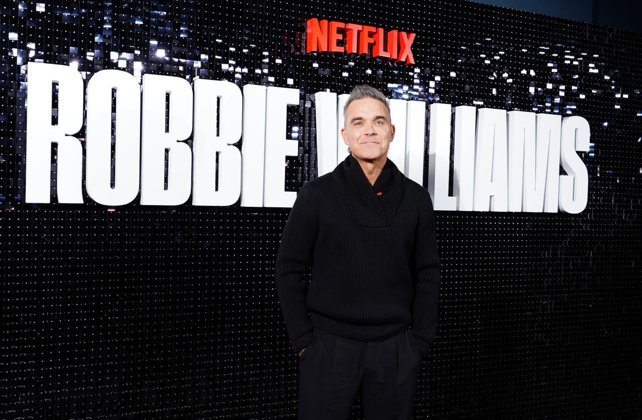 Robbie Williams surprises fans with early release of new album Britpop ...