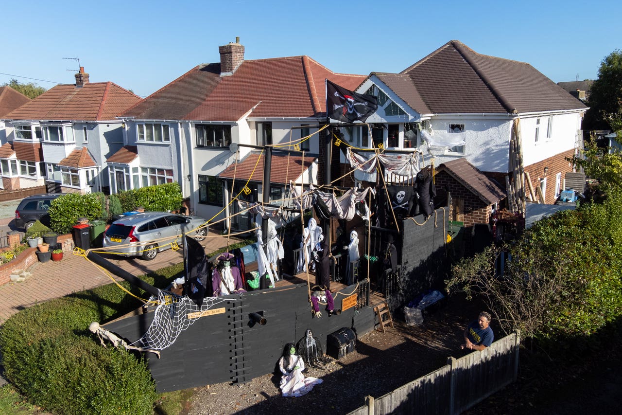 Ahoy there! Pirate ship with skeleton crew forms Halloween garden ...
