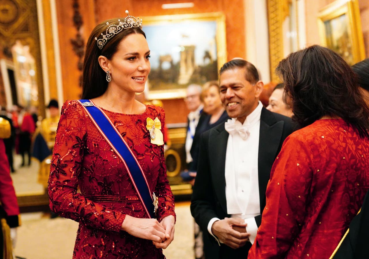 Princess of Wales sparkles in scarlet gown and tiara at diplomats ...