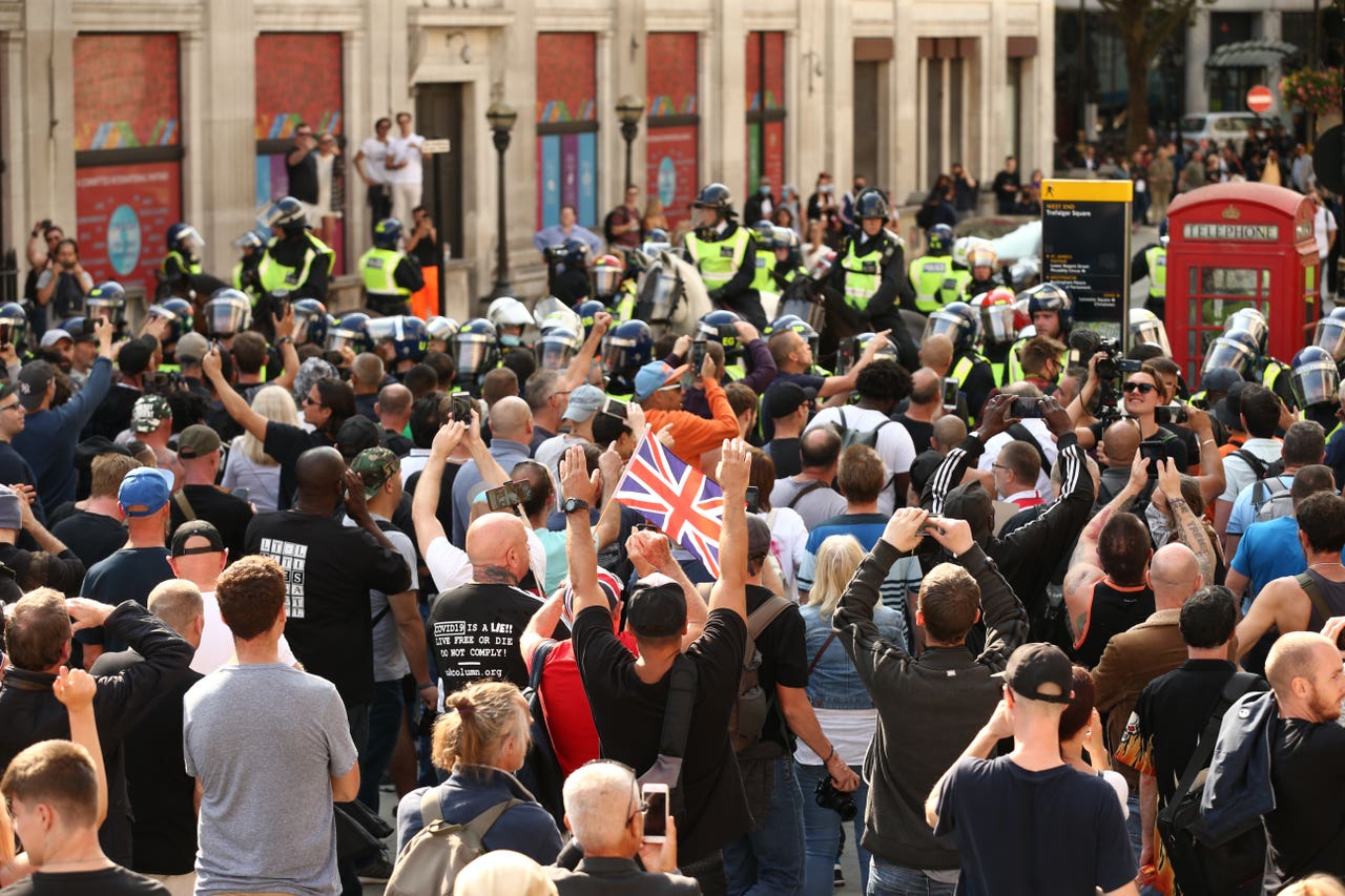 Police condemn ‘unacceptable’ outbreaks of hostility at anti-vax ...