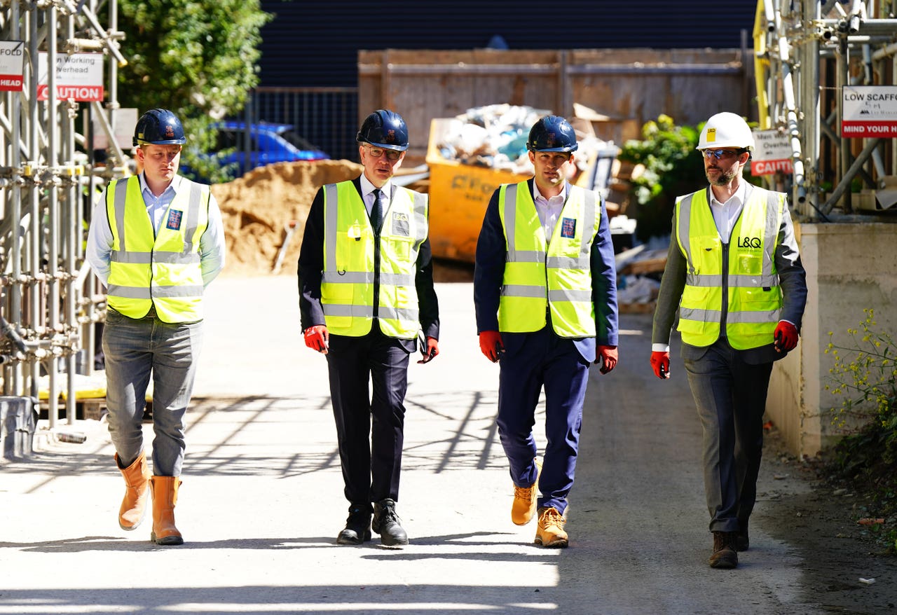 In Pictures: Hard hats on as Gove and Starmer attempt to talk housing ...