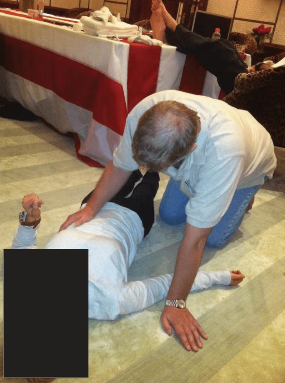 Pictures appear to show Andrew crouched over woman in latest Epstein ...
