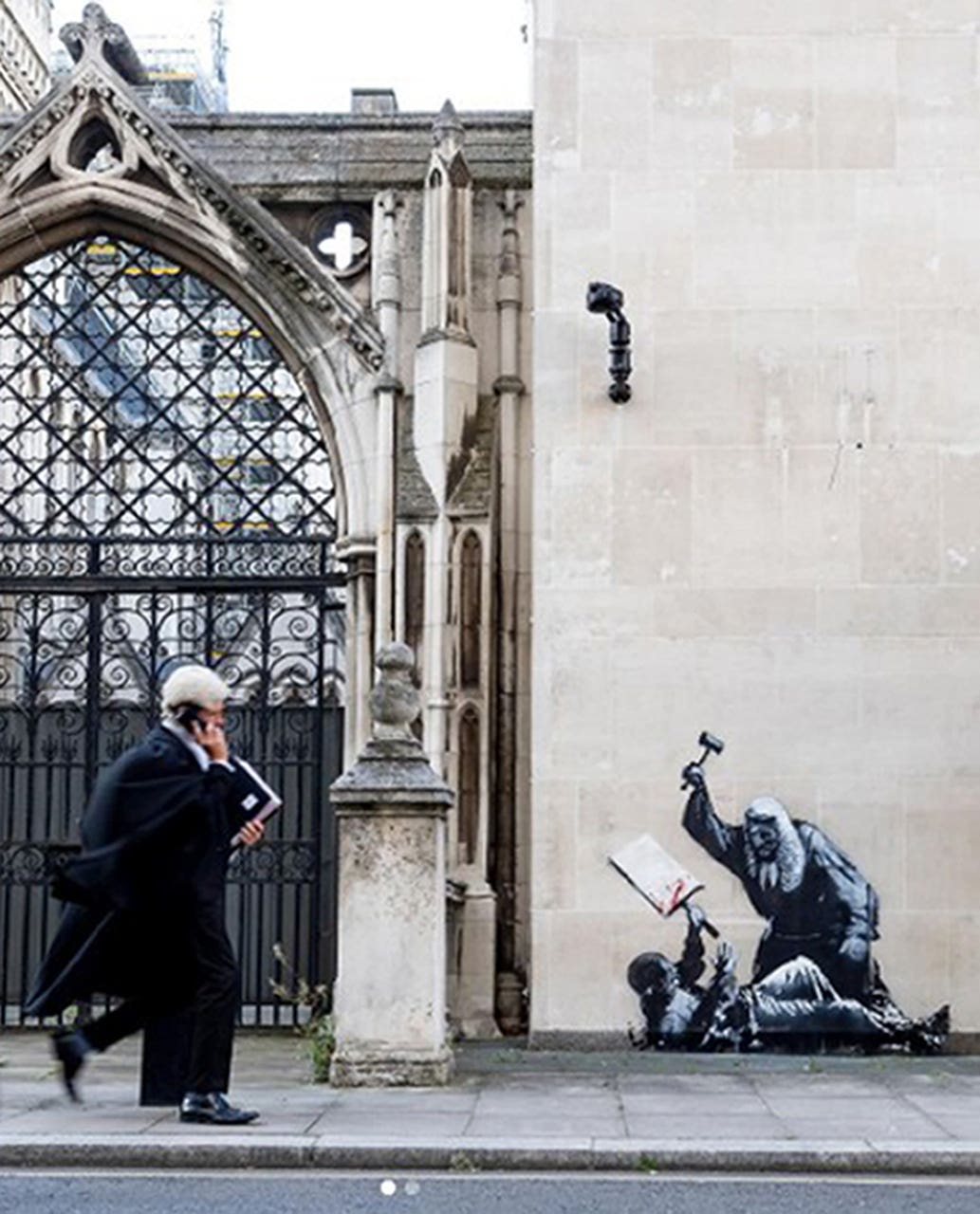 Concealed Banksy artwork shows judge beating unarmed protester ...