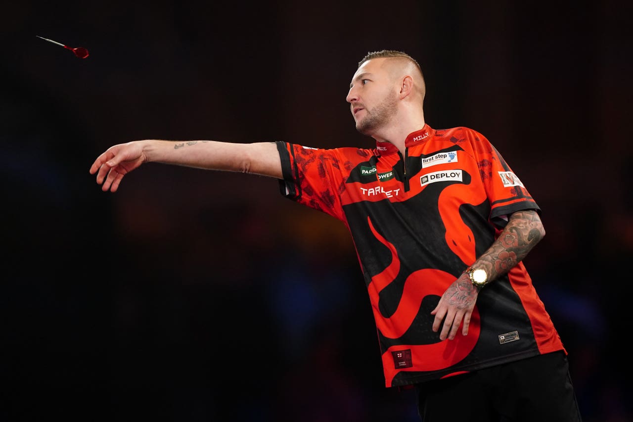 Luke Littler overcomes slow start to progress at World Darts ...