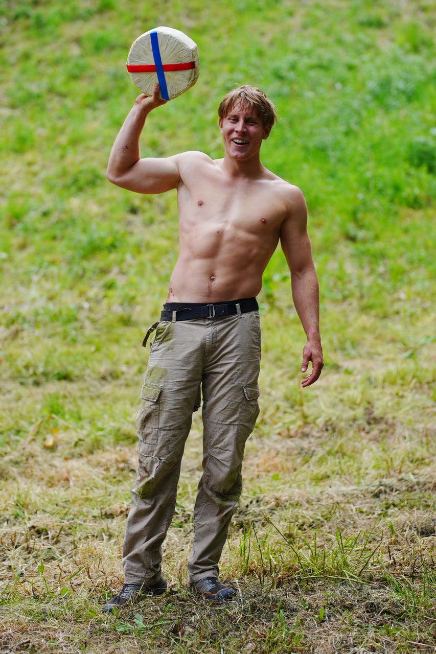 Gloucestershire cheese rolling race won again by German YouTuber Tom ...