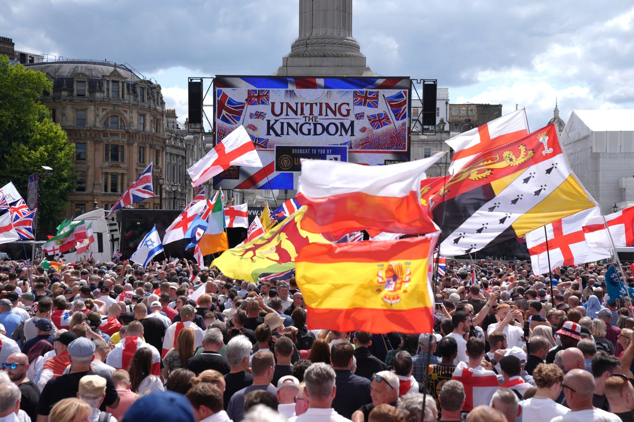 Crowds gather in central London for Tommy Robinson protest and counter ...