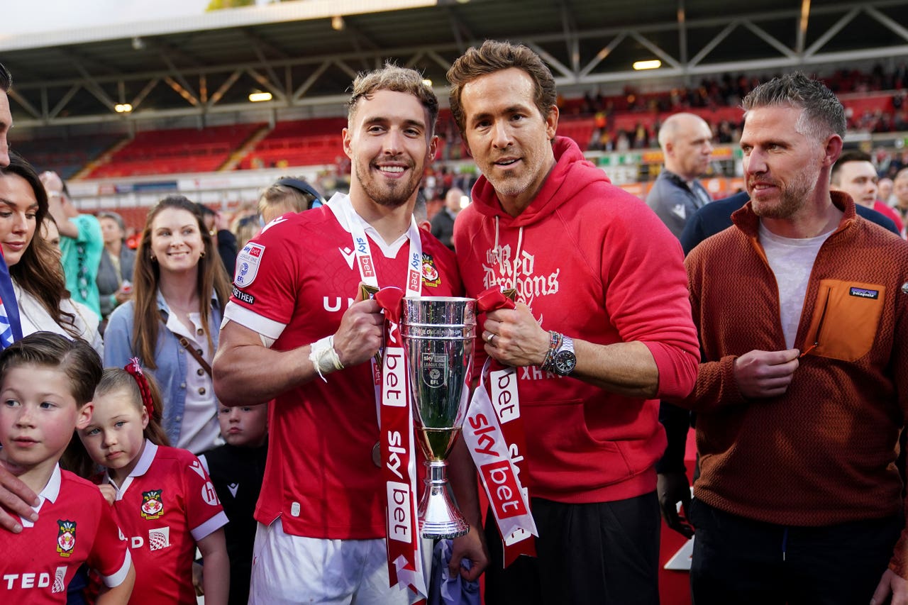 Ryan Reynolds shares kiss with Blake Lively as Wrexham earn third ...