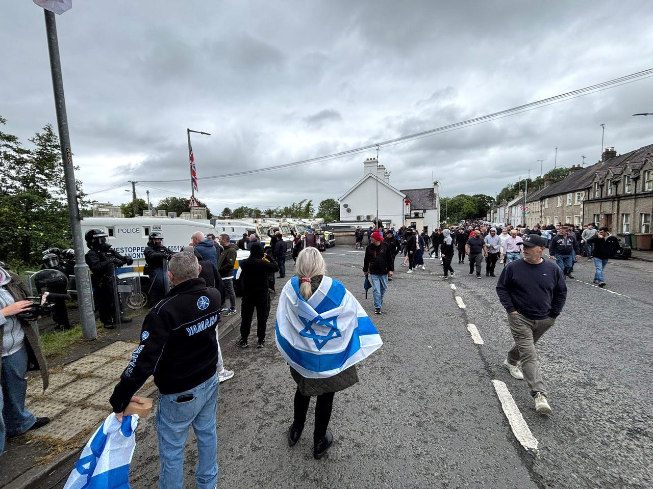 DUP MP defends photo with masked men at Scarva protest | Tivyside ...