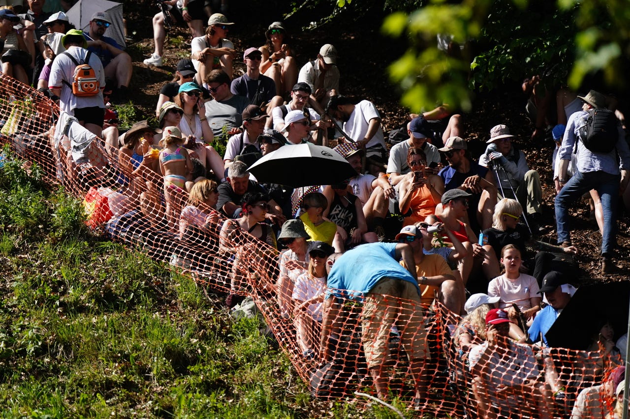 German YouTuber pips local man to win Gloucestershire cheese-rolling ...