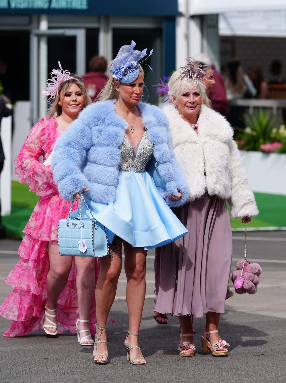 In Pictures: Racegoers lead style stakes for Ladies Day at Aintree ...
